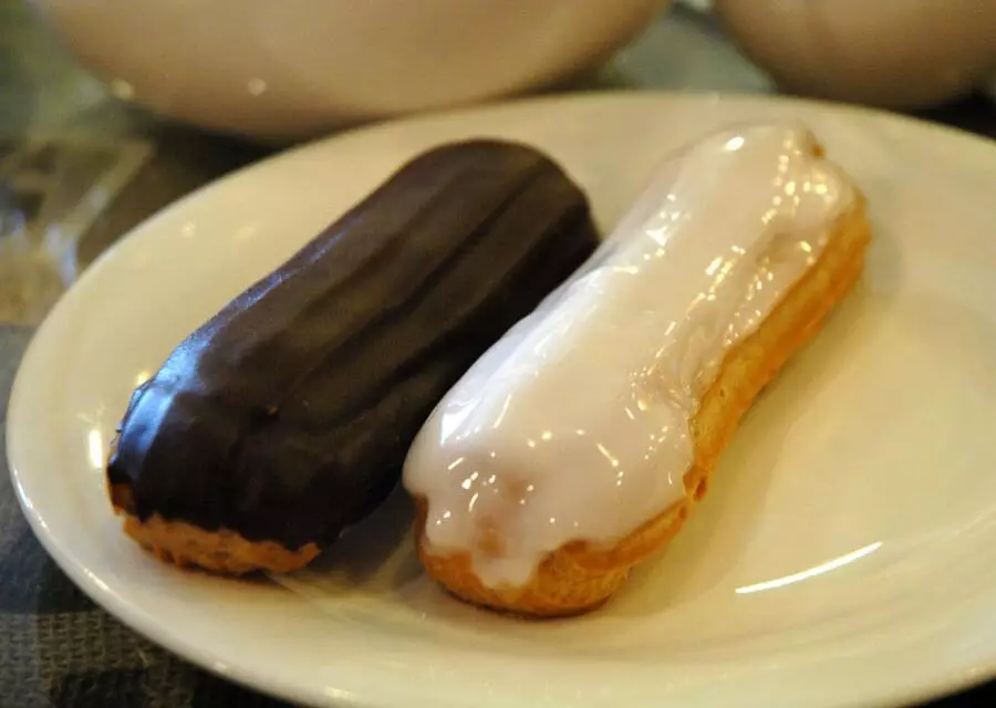 Eclair with chocolate and sugar sweet